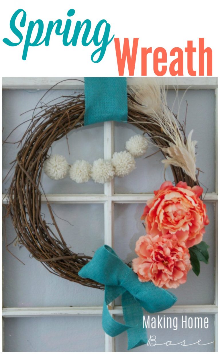 Festive DIY Spring Wreath with Florals and a pom pom garland